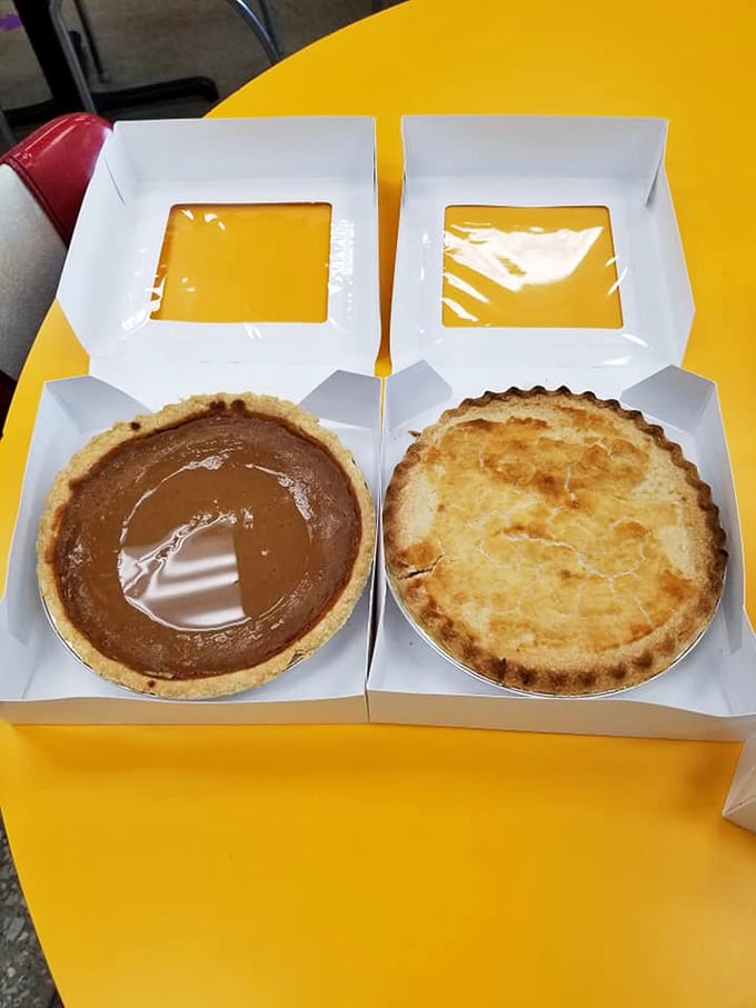 Pie oh my! Chocolate silk and golden custard, a dynamic duo to rival Batman and Robin. Gotham's got nothing on this sweet scene!