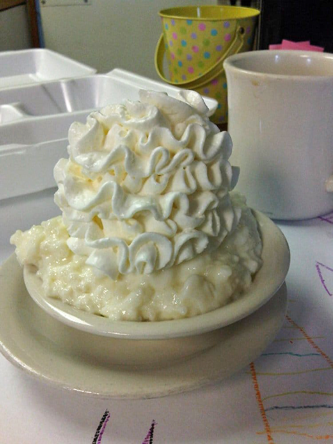 "Cloud Nine? More like Cream Cloud Divine!" This towering rice pudding is so heavenly, it might just make you believe in culinary miracles.