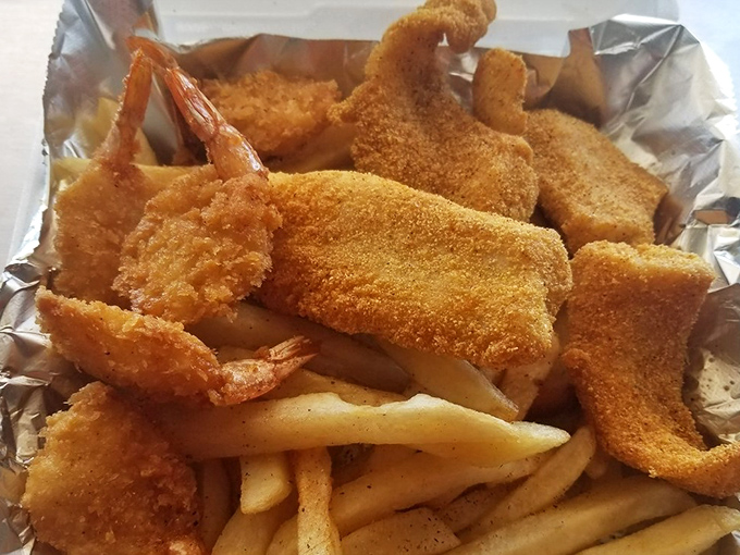 A seafood platter that would make Poseidon himself jealous. It's like a delicious treasure chest from the deep fryer!