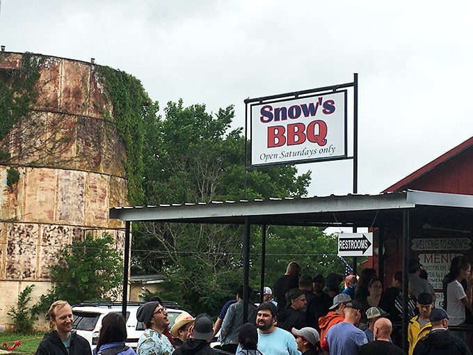 The sign says it all - BBQ paradise, open Saturdays only. This line's longer than the one for Space Mountain, but infinitely more rewarding.