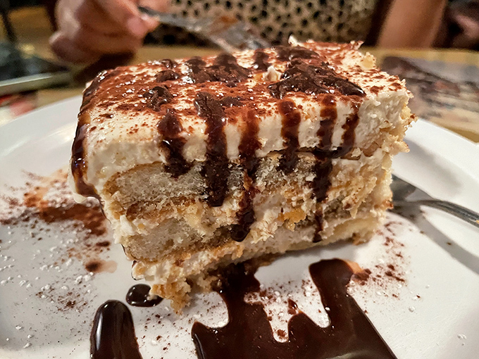 Tiramisu: Italian for "pick-me-up" or "reason to skip the gym"? Either way, this dessert is a sweet surrender worth every bite.