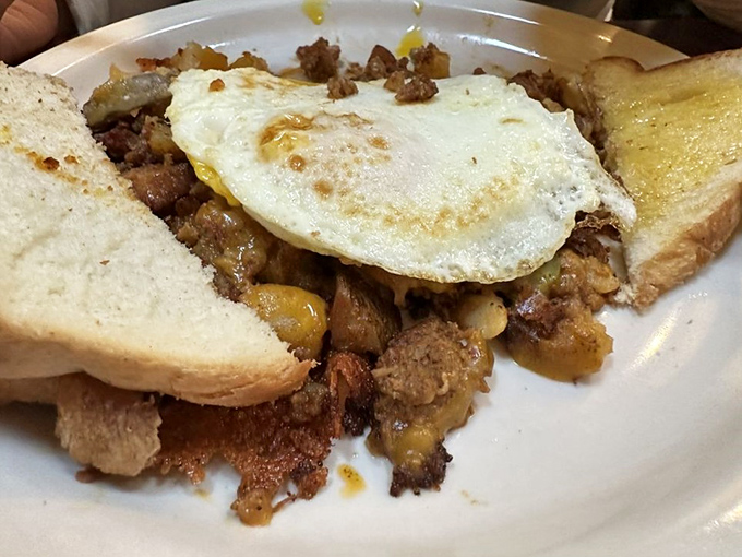 Hash brown heaven! This crispy, eggy masterpiece is the breakfast equivalent of a warm bear hug. Comfort food that speaks the universal language of "yum."