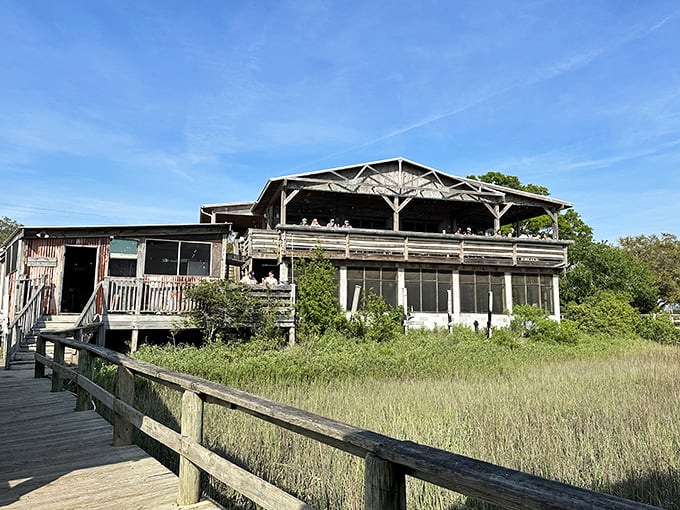 Rustic charm meets seafood paradise! This weathered wooden structure promises a feast as authentic as its salt-kissed exterior.