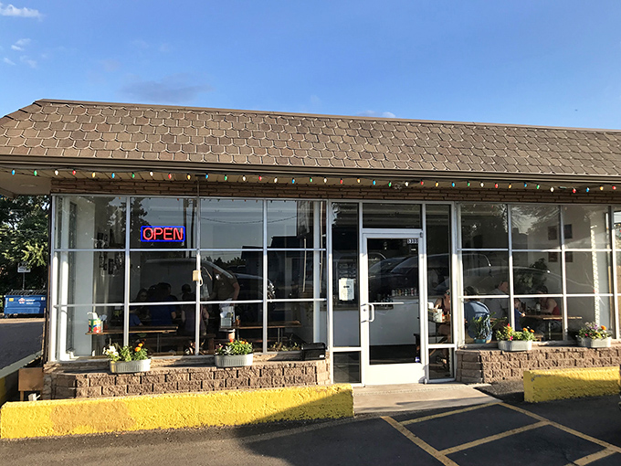 Pizzeria Lui: Where pizza dreams come true! This unassuming storefront hides a world of cheesy delights, like finding a secret level in Super Mario Bros.