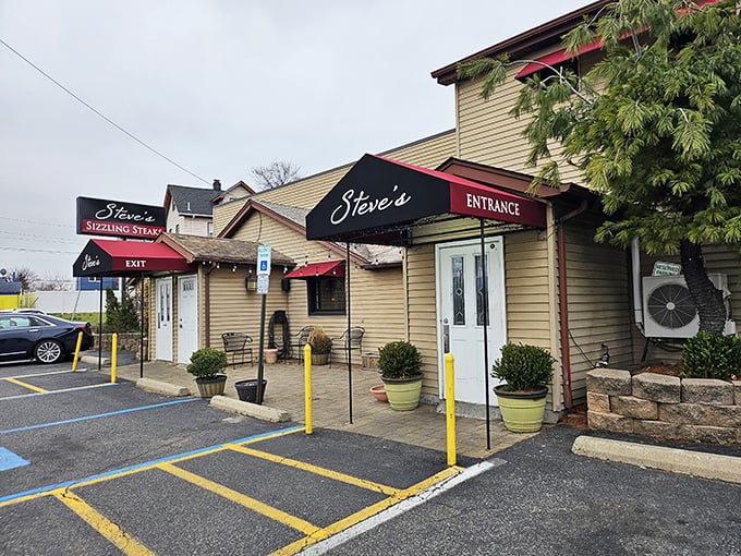 Steve's Sizzling Steaks: Where the steaks sizzle louder than your grandpa's snoring! This unassuming exterior hides a carnivore's paradise.