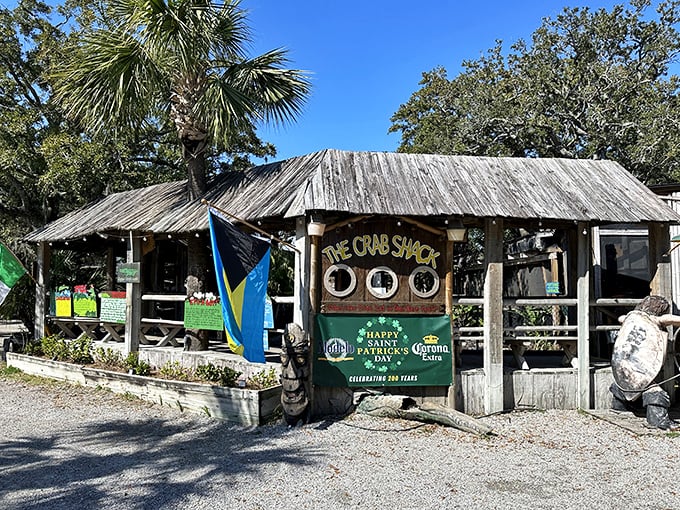 Ahoy, seafood lovers! This weathered shack is like a treasure chest of oceanic delights, where palm trees whisper promises of crab feasts.