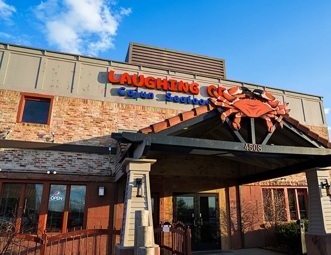 Laughing Crab: Where the crustaceans are jolly and the spices pack a punch! That giant red crab isn't just waving – he's daring you to dive in.