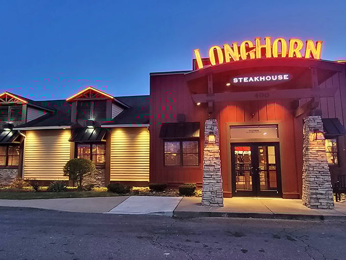 Rustic charm meets sizzling perfection. LongHorn's exterior hints at the meaty treasures within – like finding a steakhouse oasis in suburban Rhode Island.
