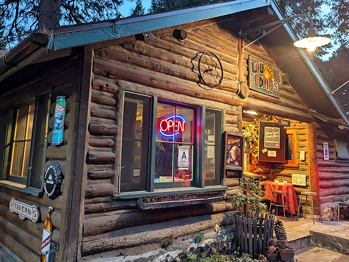 Rustic charm meets gourmet pie. At LouEddie's, the only thing more inviting than the cozy cabin exterior is the aroma of freshly baked pizza.