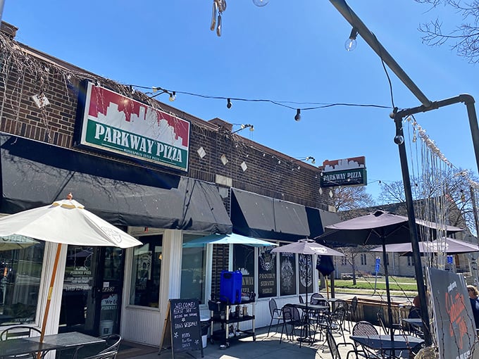 Outdoor seating at Parkway Pizza: Imagine savoring a perfect pie under twinkling lights. It's like a Tuscan evening, but with Vikings jerseys.