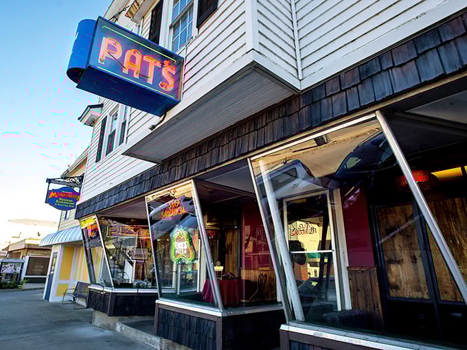 Neon dreams and pizza screams! Pat's retro sign beckons you into a world where every day is Throwback Thursday, complete with piping hot pies.