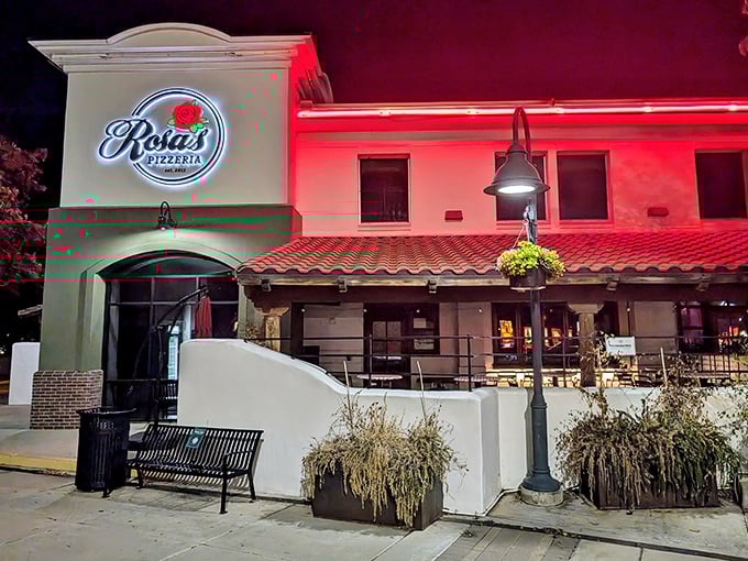 Rosa's Pizzeria glows like a warm Italian welcome against the Arizona night sky, beckoning hungry travelers with promises of perfect crust.