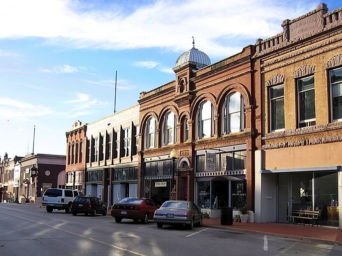 "Downtown Delights: A Stroll Through Time" Brick buildings stand proud, their arched windows and decorative cornices whispering tales of Oklahoma's past. It's like Main Street, USA come to life!