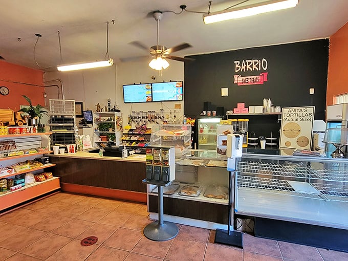 Step into flavor town! This no-frills interior might not win design awards, but trust me, the real masterpieces are coming out of that kitchen.