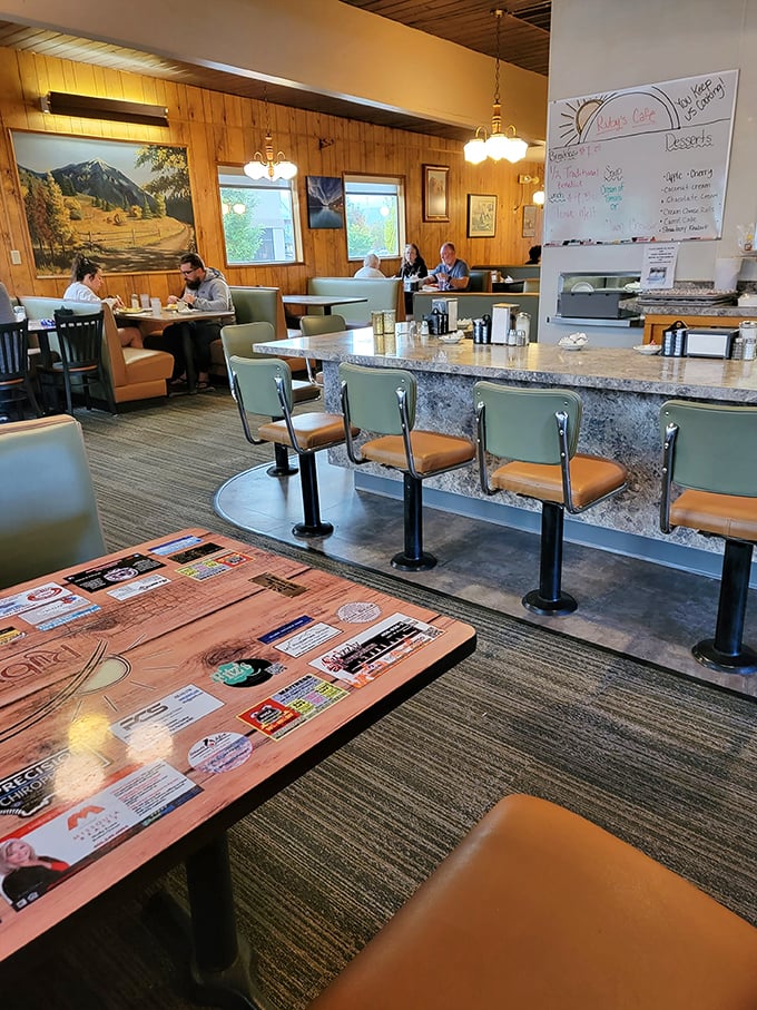 Step inside and travel back in time. Wood paneling, cozy booths, and a counter that's seen more stories than a library.
