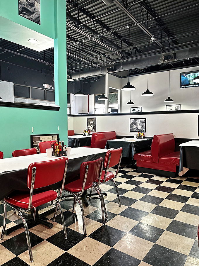 Checkered floors and cherry-red booths - this isn't just a meal, it's a trip to the set of "Happy Days"!