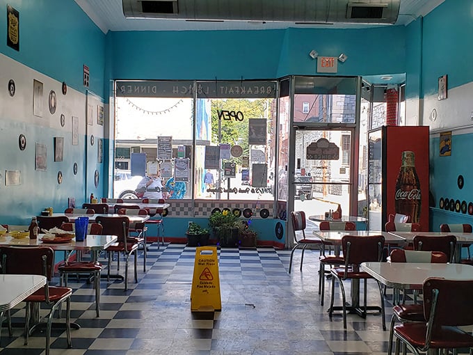 Welcome to the land of turquoise dreams and checkered floors. This isn't just a diner; it's a portal to simpler times and bottomless coffee.
