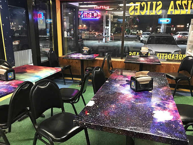 Dining on stardust? These cosmic tables transport you to nebulas unknown, all while savoring Earth's finest pizzas.