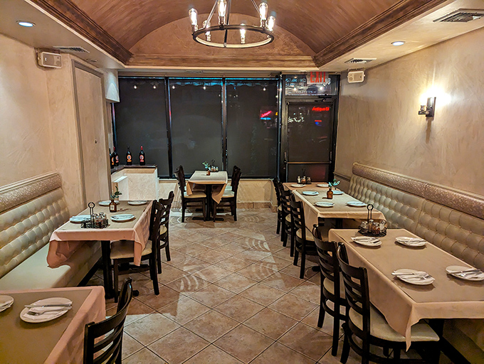 Step into pizza paradise! This cozy dining room is where thin-crust dreams come true, with a dash of old-school charm.