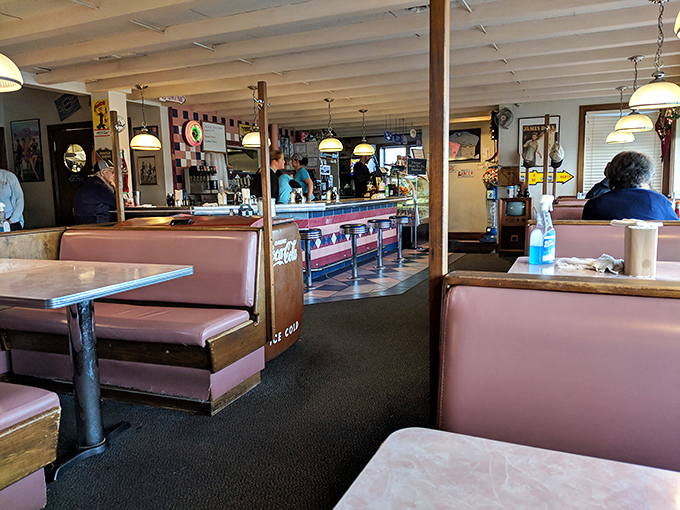 Step inside and be greeted by a sea of pink vinyl booths and checkerboard dreams. It's like "Happy Days" met "Diners, Drive-Ins and Dives" and decided to settle down in Massachusetts.