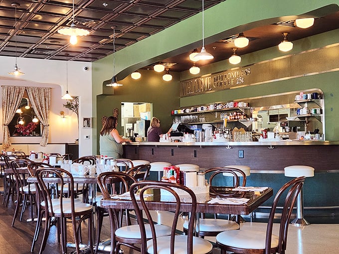 Step into a time warp where mid-century charm meets modern comfort. This diner's interior is cozier than your grandma's living room &ndash; and the food's better too!