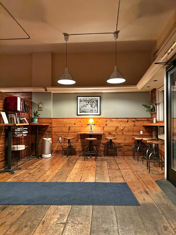 Step into a cozy time capsule where wood, warmth, and the aroma of perfect pizza transport you to a simpler, more delicious era.