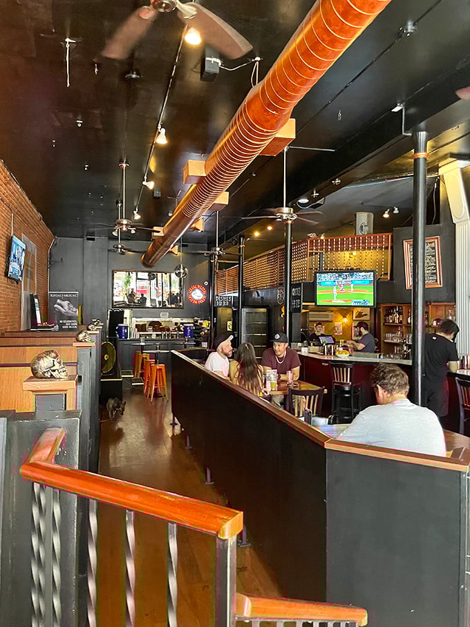 Step inside and feel the buzz of anticipation. This isn't just a bar; it's a shrine to the almighty chicken wing.