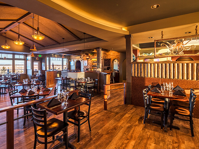 Inside, warm wood tones and thoughtful lighting create the perfect backdrop for culinary magic – like a cozy theater where the food plays the starring role.