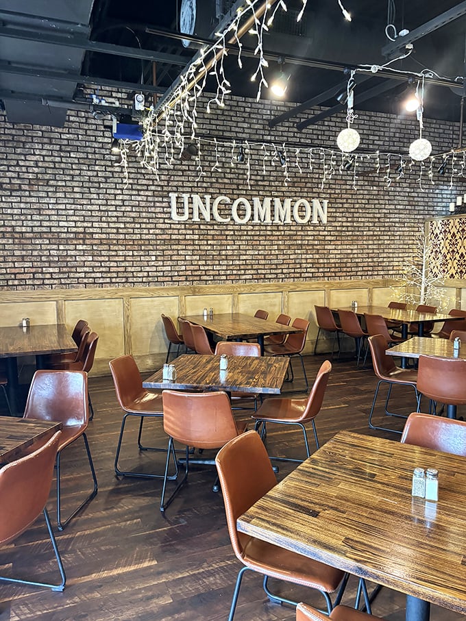 Exposed brick walls, warm wood tables, and leather chairs create a space that's both rustic and refined&mdash;comfort with a dash of cool.