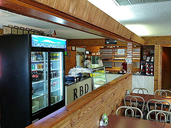 Inside, rustic wood paneling and simple seating create the perfect no-frills atmosphere where the star attractions are behind the counter.