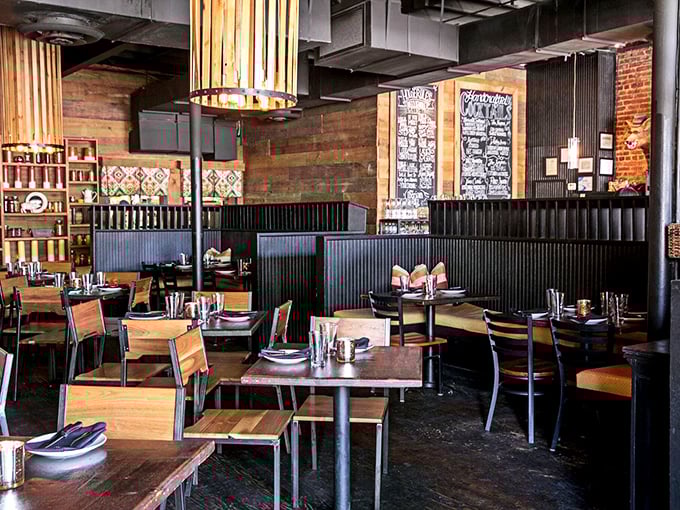 Inside, rustic wooden tables and ambient lighting create the kind of atmosphere where both first dates and golden anniversaries feel equally at home.