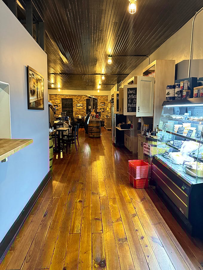 Rustic meets refined in this cozy interior. With warm wood tones and a gleaming display case, it's like your favorite pub got a makeover from Chip and Joanna Gaines.