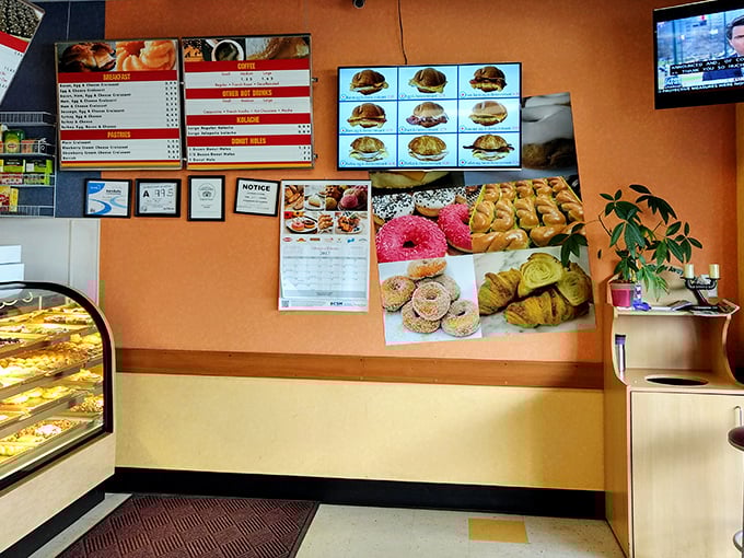 Step into a world where calories don't count. This cozy interior is like Willy Wonka's factory, but for grown-ups who prefer fried dough to chocolate rivers.