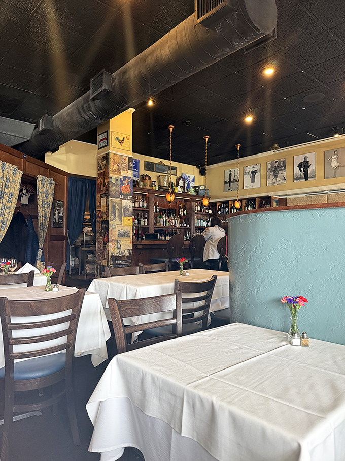 Step inside and be transported! This cozy interior feels like your cool French aunt's living room, if she had impeccable taste and a fully stocked bar.