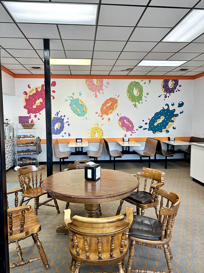 Step into a world where calories don't count and happiness is measured in frosting. This interior mural is like Jackson Pollock decided to trade his paint for donuts &ndash; deliciously abstract!