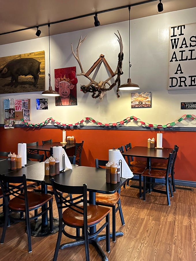 Step inside and you're greeted by a quirky blend of Montana charm and BBQ flair. It's like a hoedown in a hunting lodge, with a side of sauce.