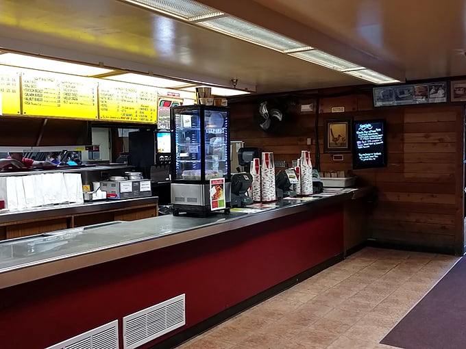 Step inside and travel back in time! The interior's wood-paneled warmth whispers tales of countless satisfied burger lovers.