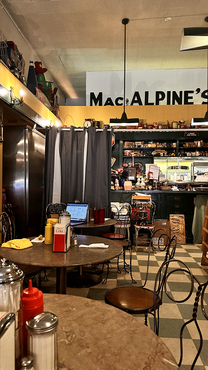 Welcome to the time warp! MacAlpine's interior is a treasure trove of nostalgia, where every nook and cranny tells a story of simpler times and sweeter treats.
