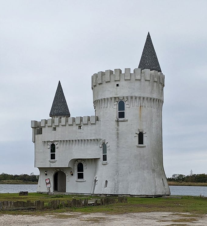 Who needs a moat when you've got a lake? This charming fortress looks ready to repel invading alligators or welcome weary travelers seeking refuge from the heat.