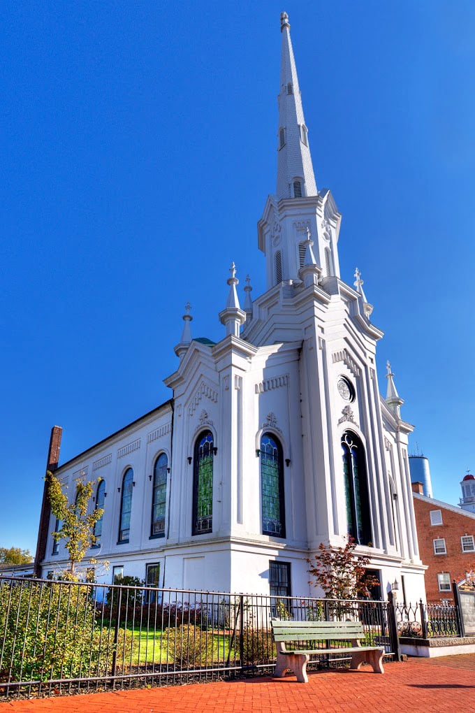 Heavenly architecture alert! This pristine church spire reaches for the sky like a holy exclamation point punctuating Salem's skyline.