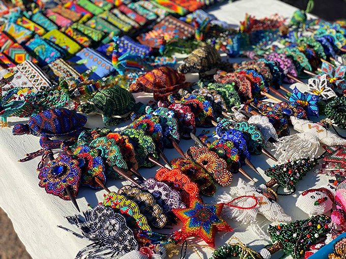 Beaded brilliance! These vibrant Huichol art pieces are like wearable rainbows, each one a kaleidoscope of color and culture. Who needs a pot of gold?