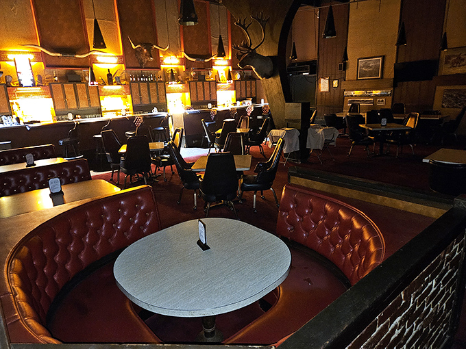 Step into a time capsule where Mad Men meets Midwest charm. The red leather booths practically whisper, "Sit down, stay awhile, and loosen that belt."