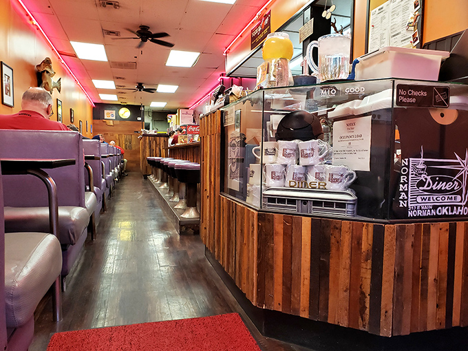 The narrow layout with its wooden counter and purple booths isn't trying to be retro-cool&mdash;it earned every bit of its character the honest way.