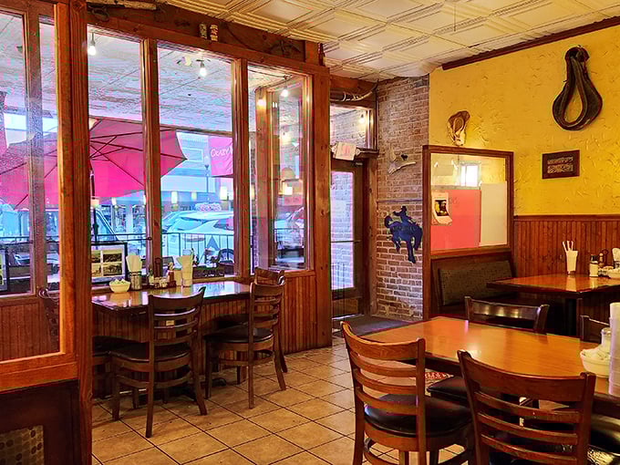 Step inside and you're transported to a cozy cowboy haven. It's like John Wayne's living room, if he served killer comfort food.