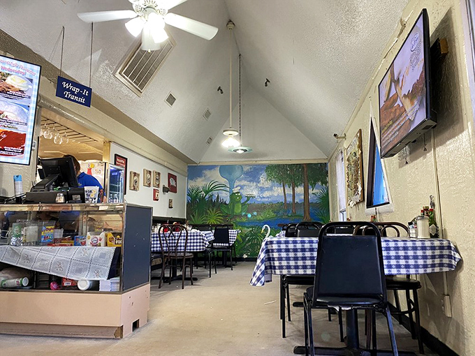 Step into a time capsule of cozy charm. This interior could be the set for the next great American sitcom about food and friendship.