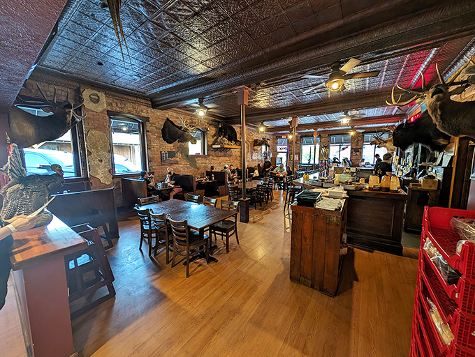 Step inside and the pressed tin ceiling, exposed brick, and mounted trophies tell you this isn't some BBQ theme park&mdash;it's the real Nebraska deal.