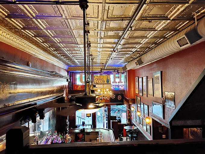 That ornate tin ceiling isn't just showing off&mdash;it's witnessed everything from prohibition whispers to modern-day revelry beneath its golden glow.