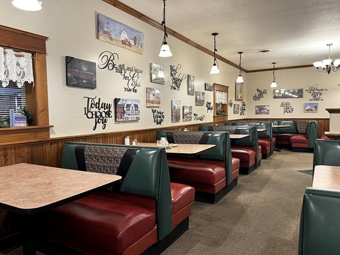 Classic diner booths invite you to settle in for comfort food that transcends time. The inspirational wall quotes remind you to savor every bite.