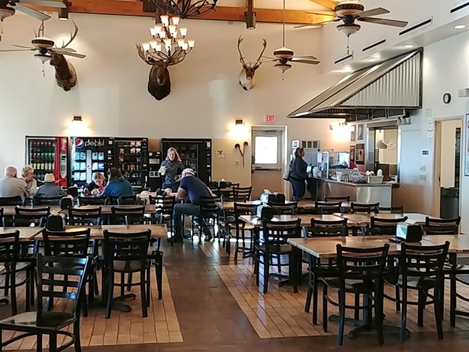 Mounted deer heads watch over diners in this no-frills dining room where the only thing fancier than the decor is the flavor in your food.