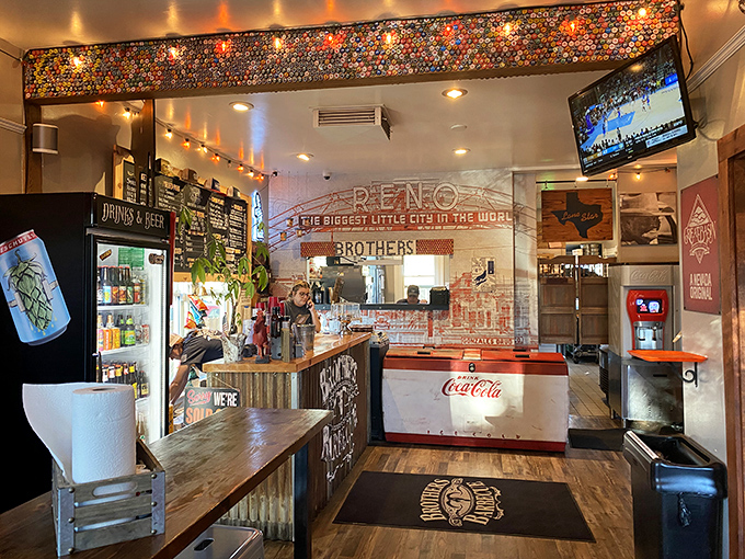Bottle cap art meets barbecue brilliance. The interior blends Reno pride with Texas tradition, creating an atmosphere where both locals and tourists feel instantly welcome.